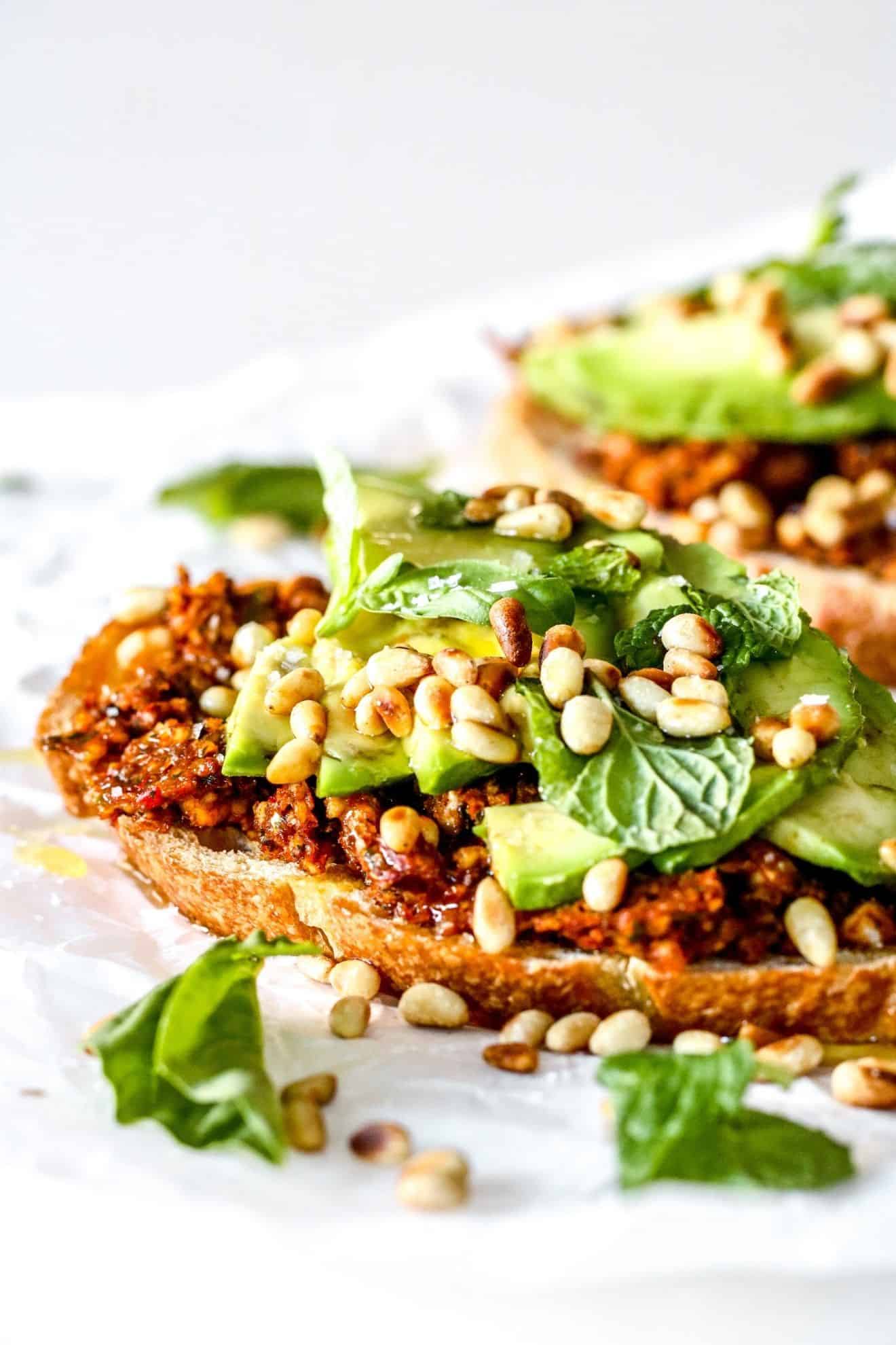 The BEST Avocado Toast + Harissa Almond Pesto - The Toasted Pine Nut